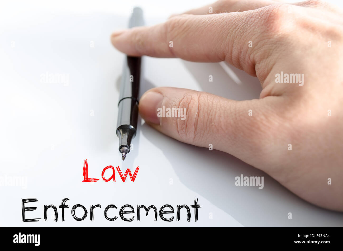 Law enforcement text concept isolated over white background Stock Photo ...