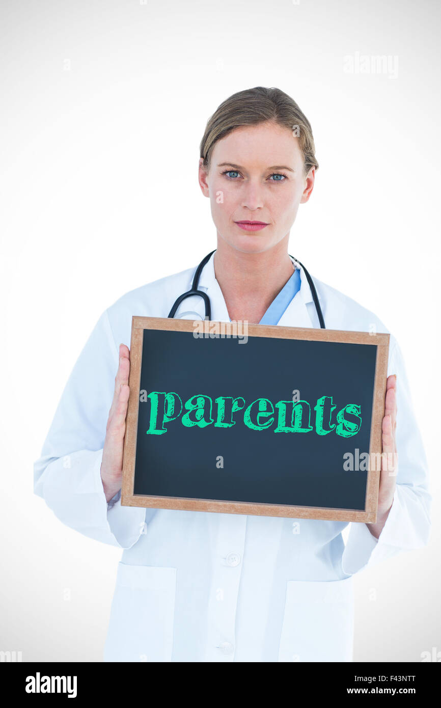 Parents against doctor showing chalkboard Stock Photo - Alamy