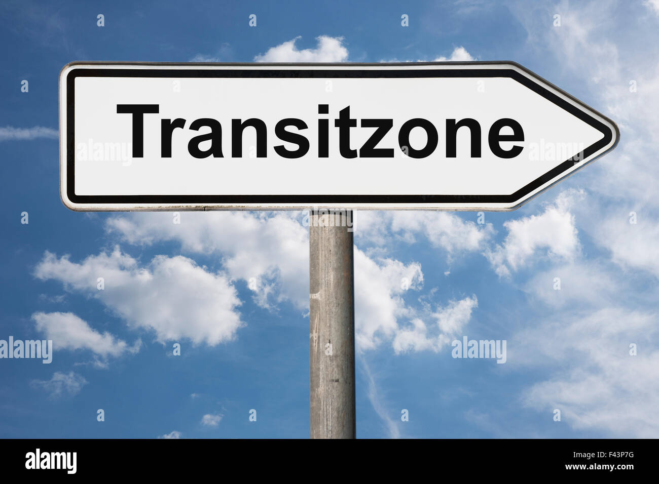 Detail photo of a signpost with the German title Transitzone (Transit ...