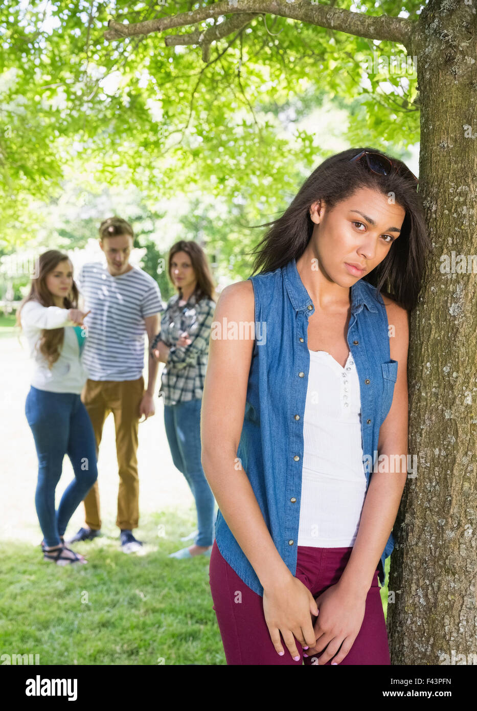Lonely student being bullied by her peers Stock Photo - Alamy