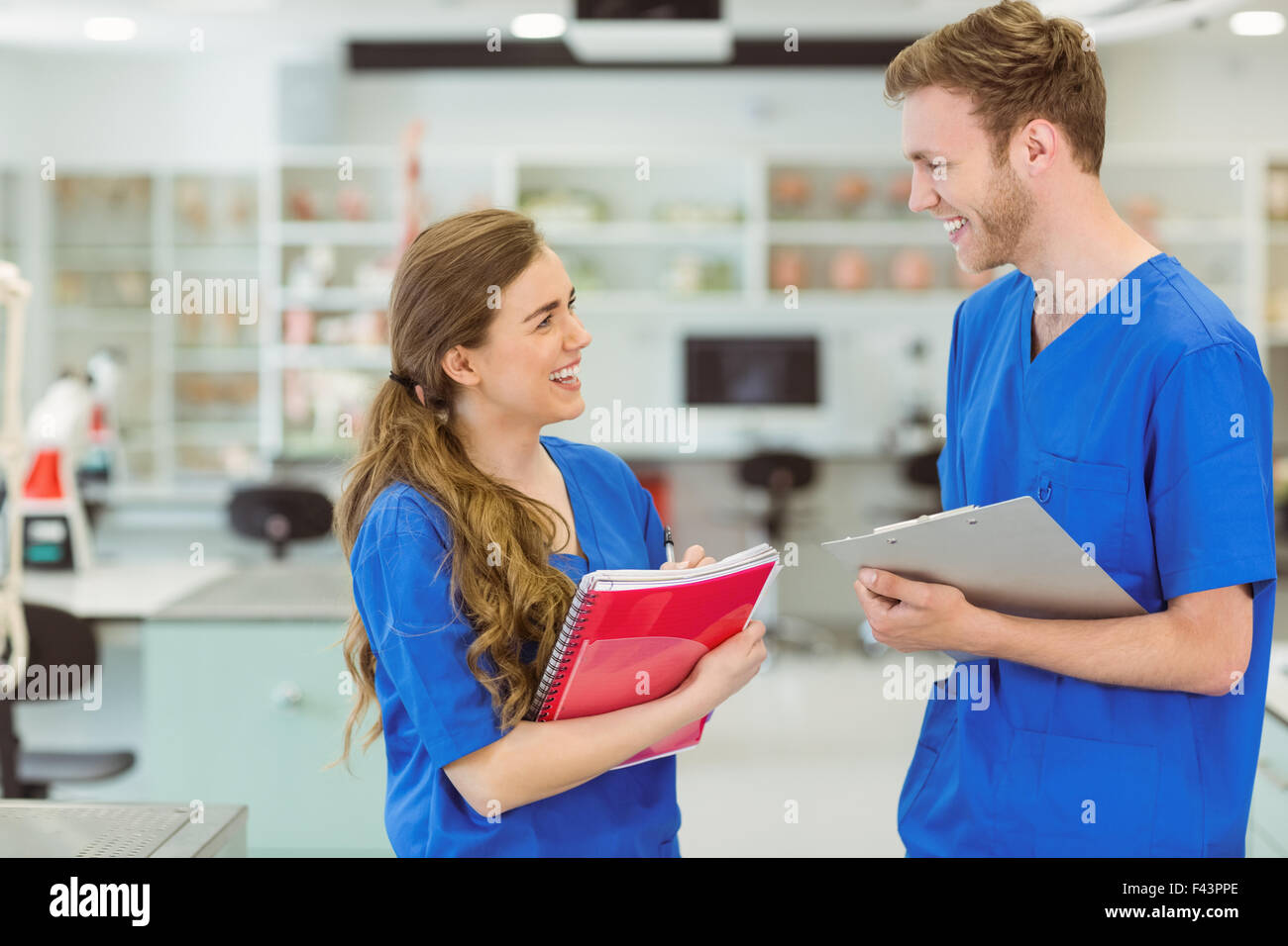 Young medical students smiling at each other Stock Photo - Alamy