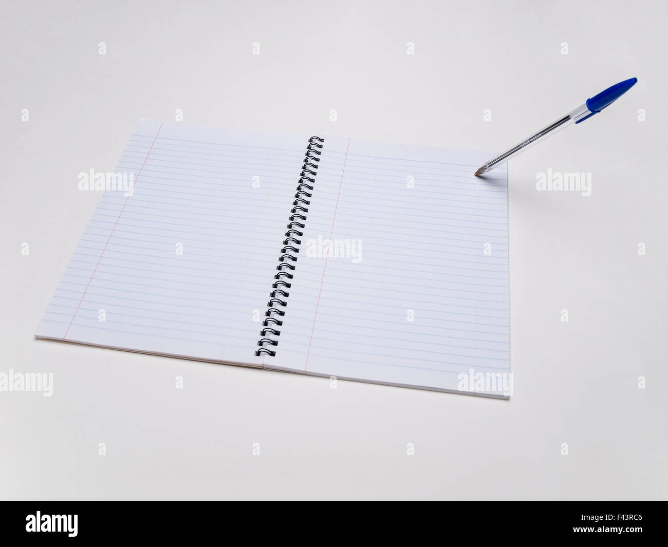 Bic Crystal Blue Pen on white notepad Stock Photo - Alamy