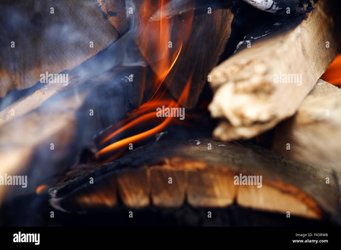 Flames and glow in a wood burner Stock Photo - Alamy