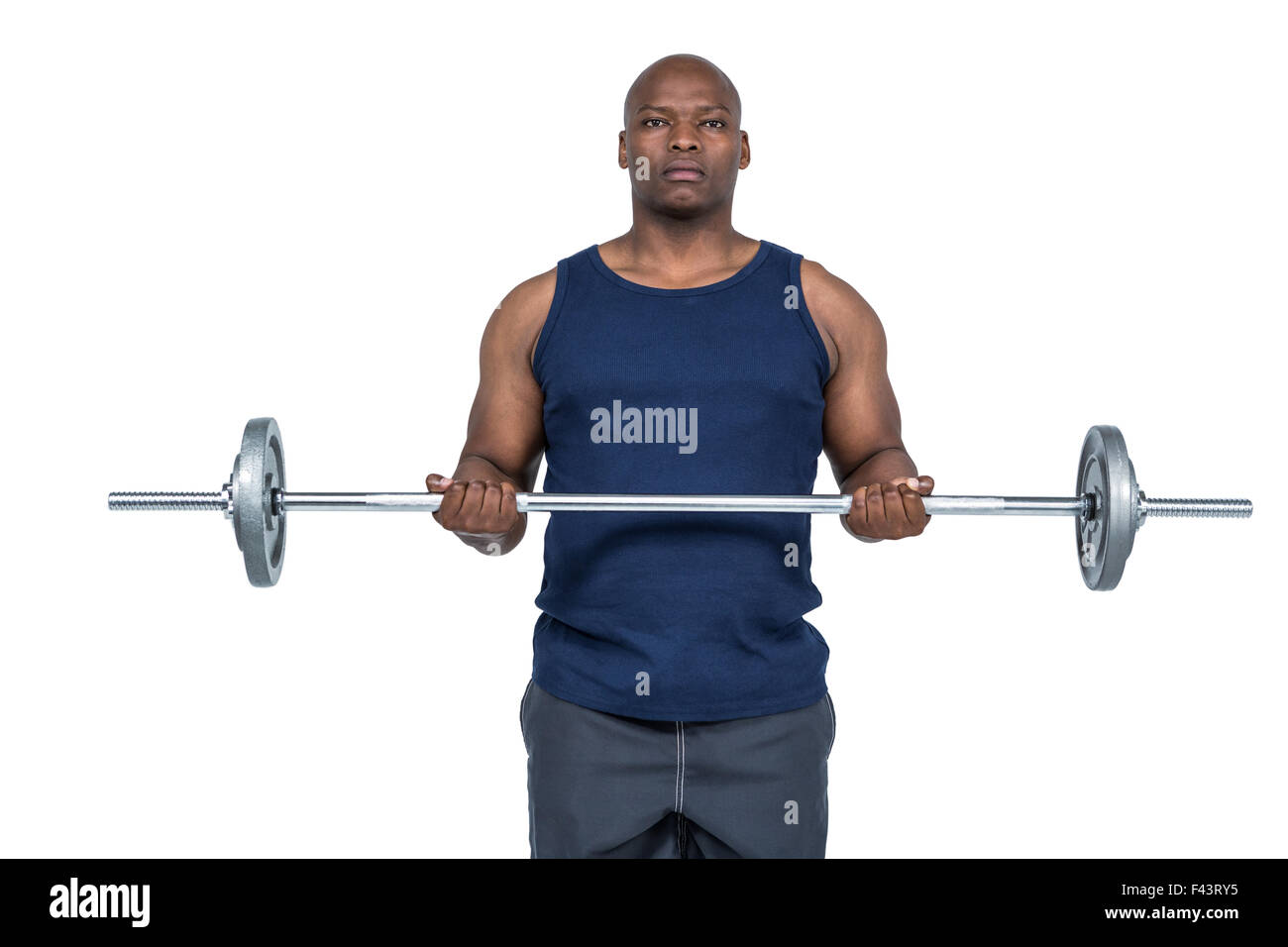 Fit man lifting heavy barbell Stock Photo - Alamy