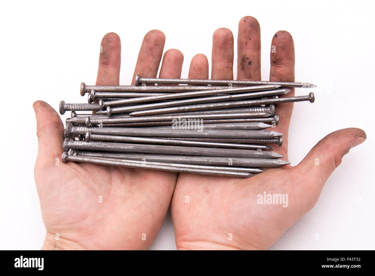 Hand holding screws hi-res stock photography and images - Alamy
