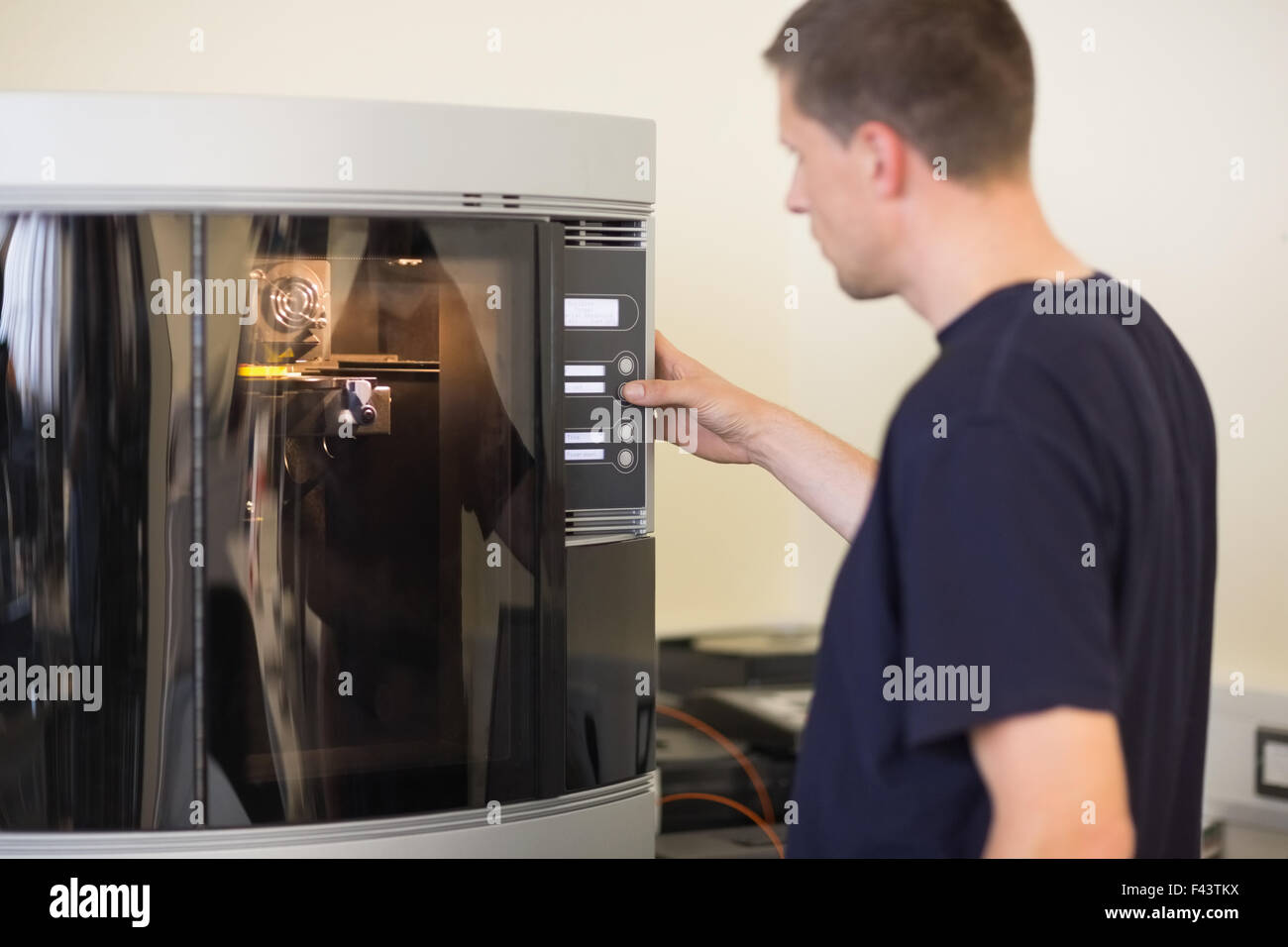 Engineering student using 3d printer Stock Photo - Alamy