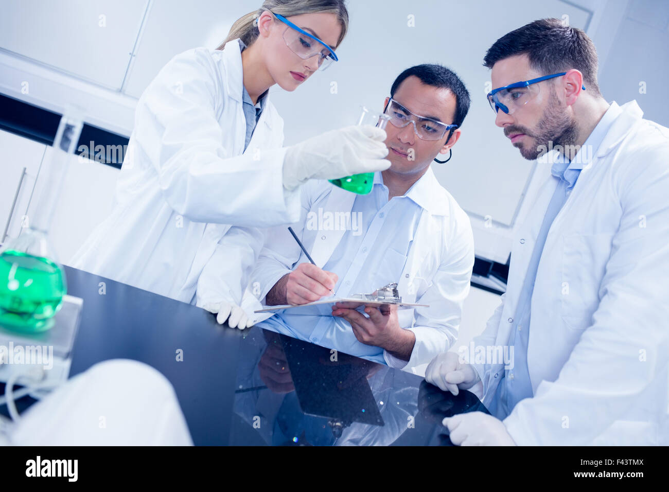 Chemistry students together laboratory hi-res stock photography and ...