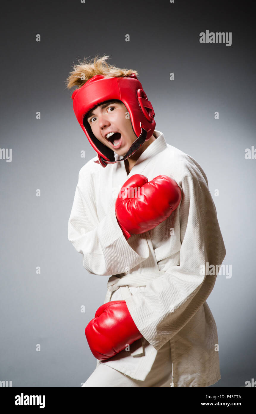Funny boxer against dark background Stock Photo - Alamy