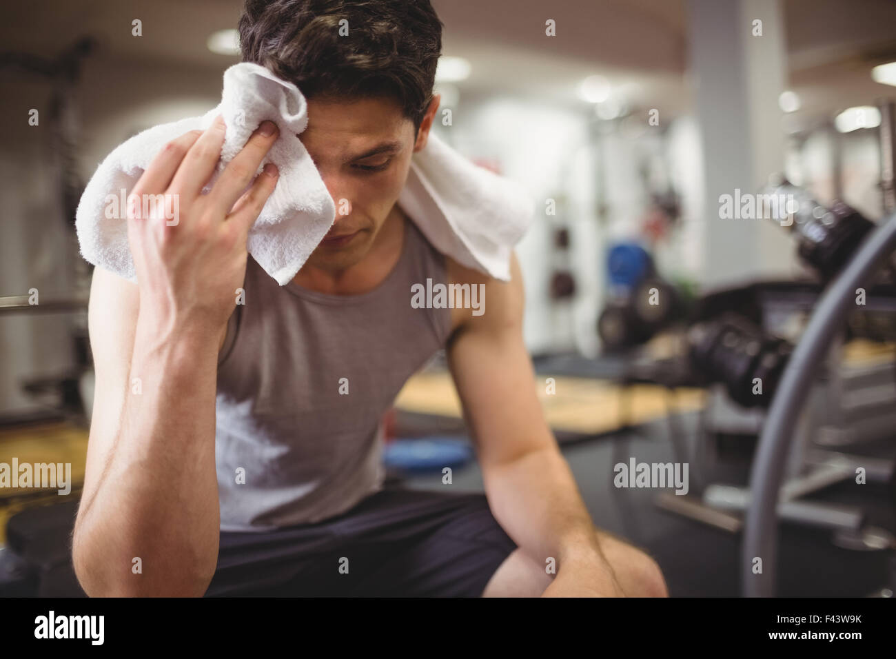 Fit man taking a break from working out Stock Photo - Alamy