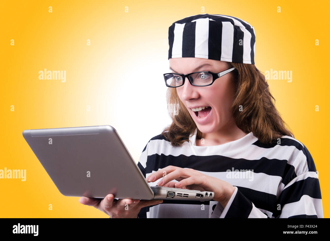 Criminal hacker with laptop on white Stock Photo - Alamy