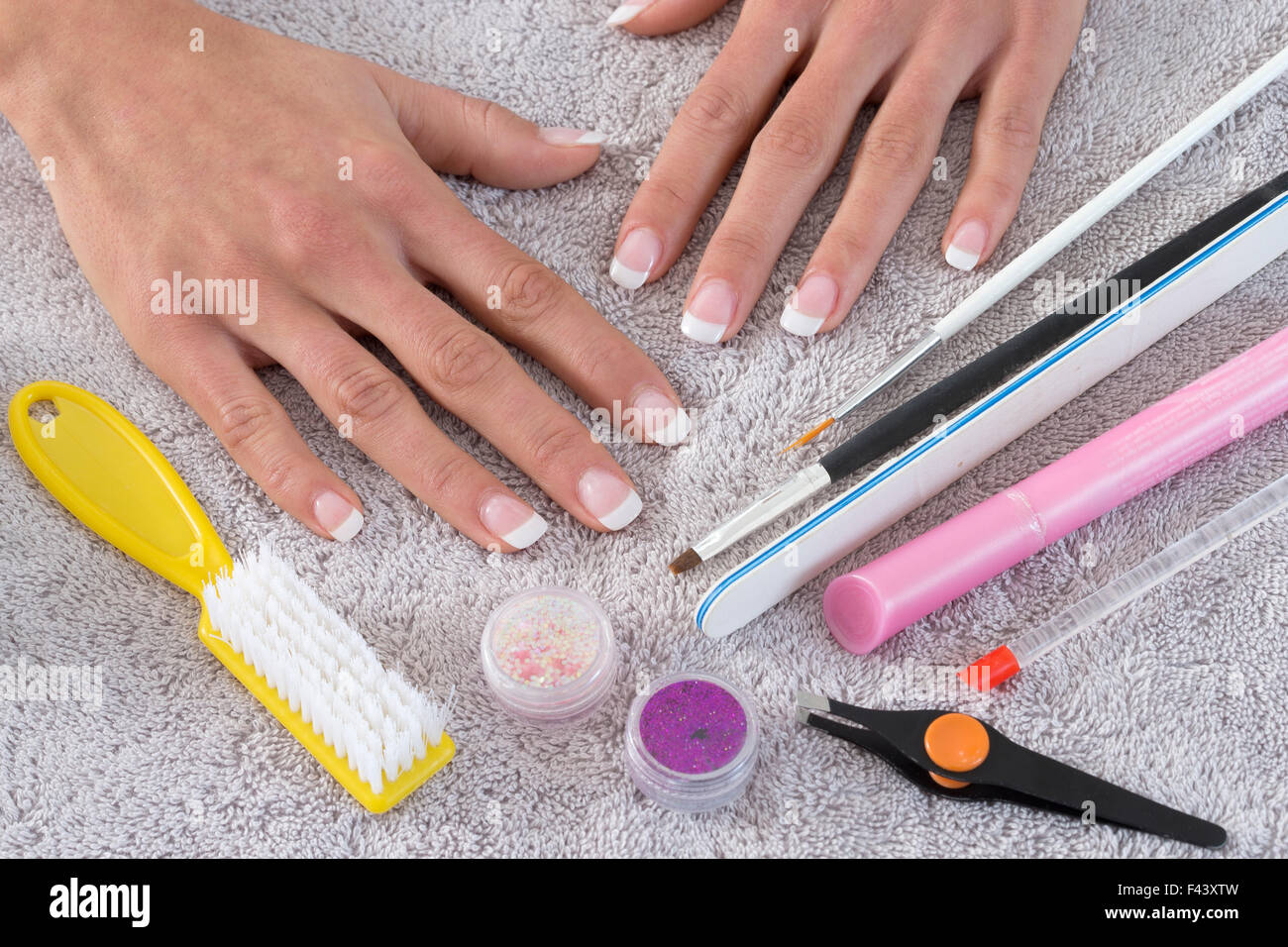 Hands of young woman with manicure Stock Photo - Alamy