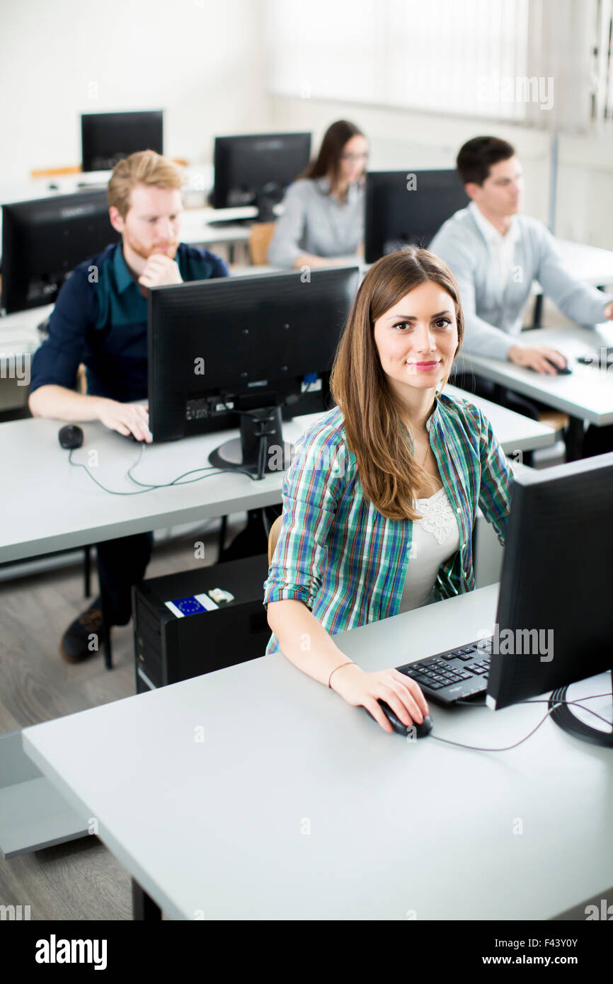 Young people in the classroom Stock Photo - Alamy