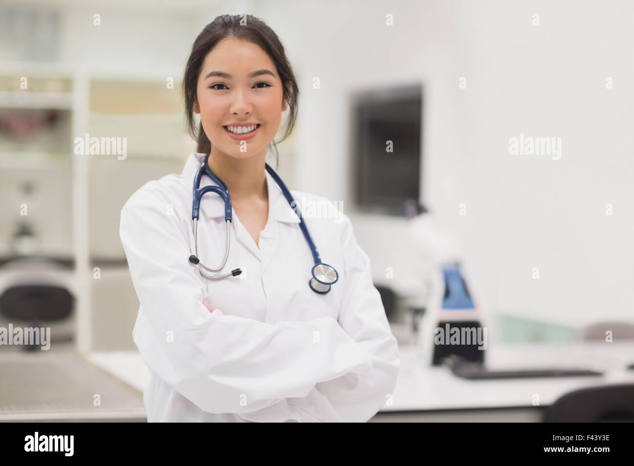 Pretty medical student smiling at camera Stock Photo - Alamy