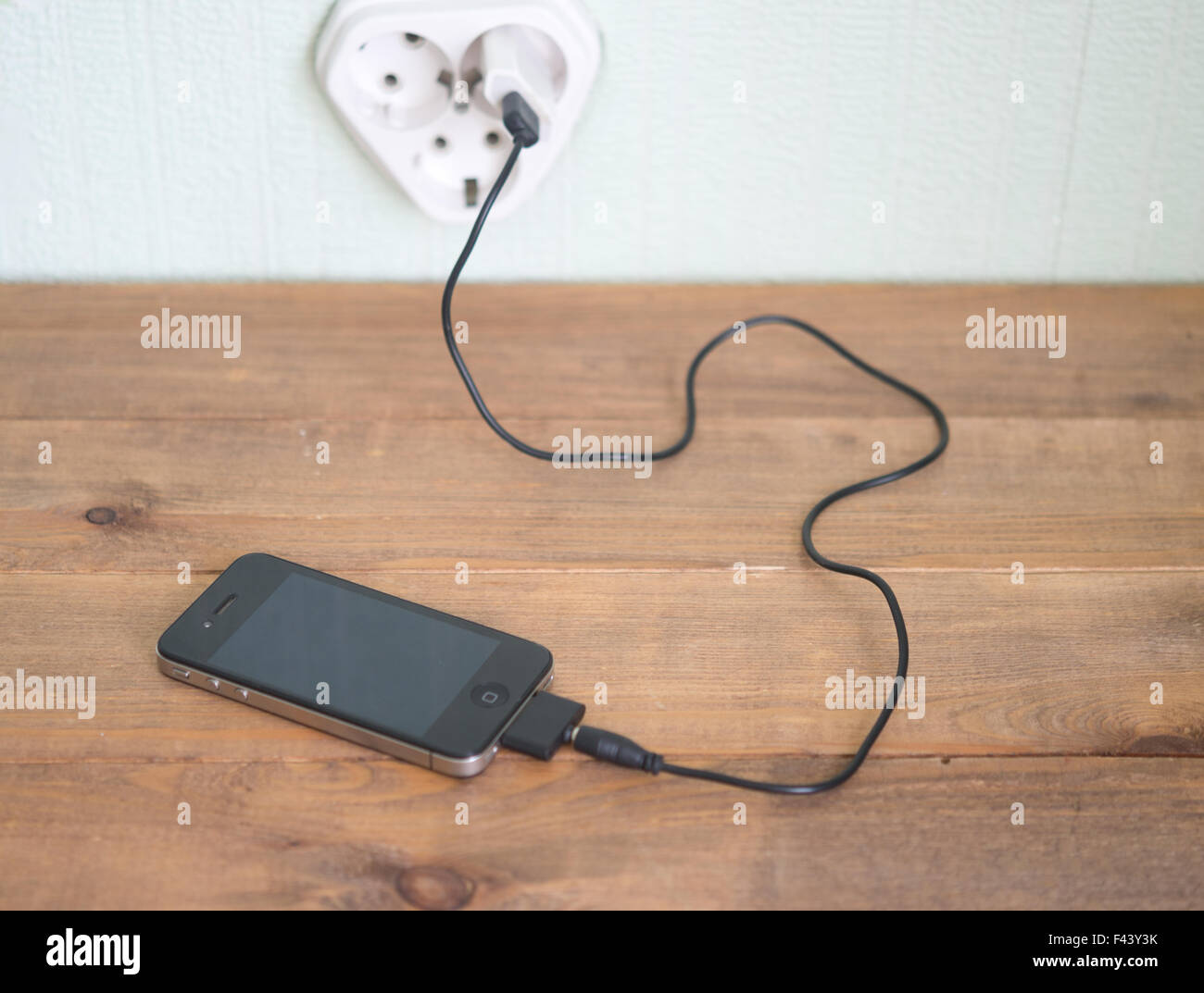 Charging phone wall hi-res stock photography and images - Alamy