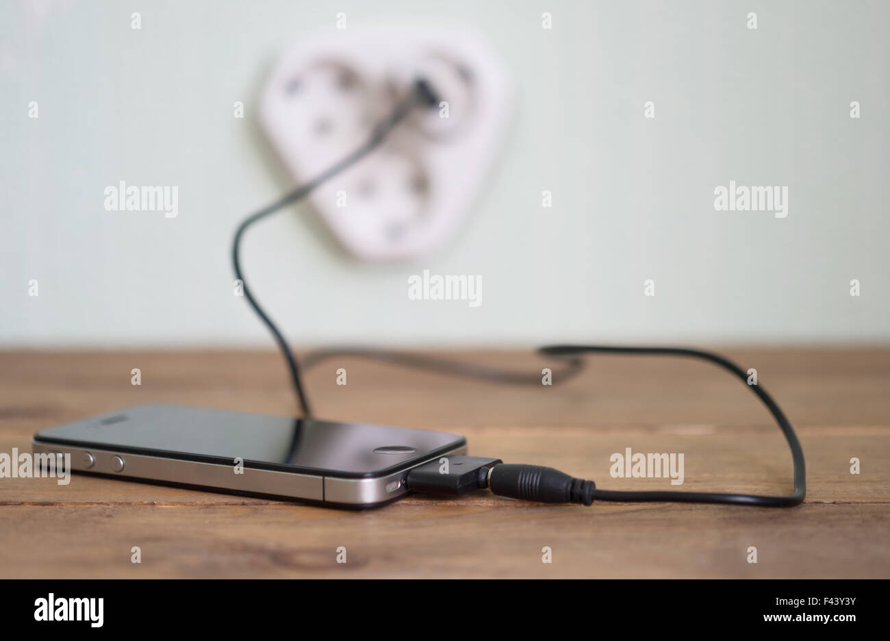 Charging phone wall hi-res stock photography and images - Alamy