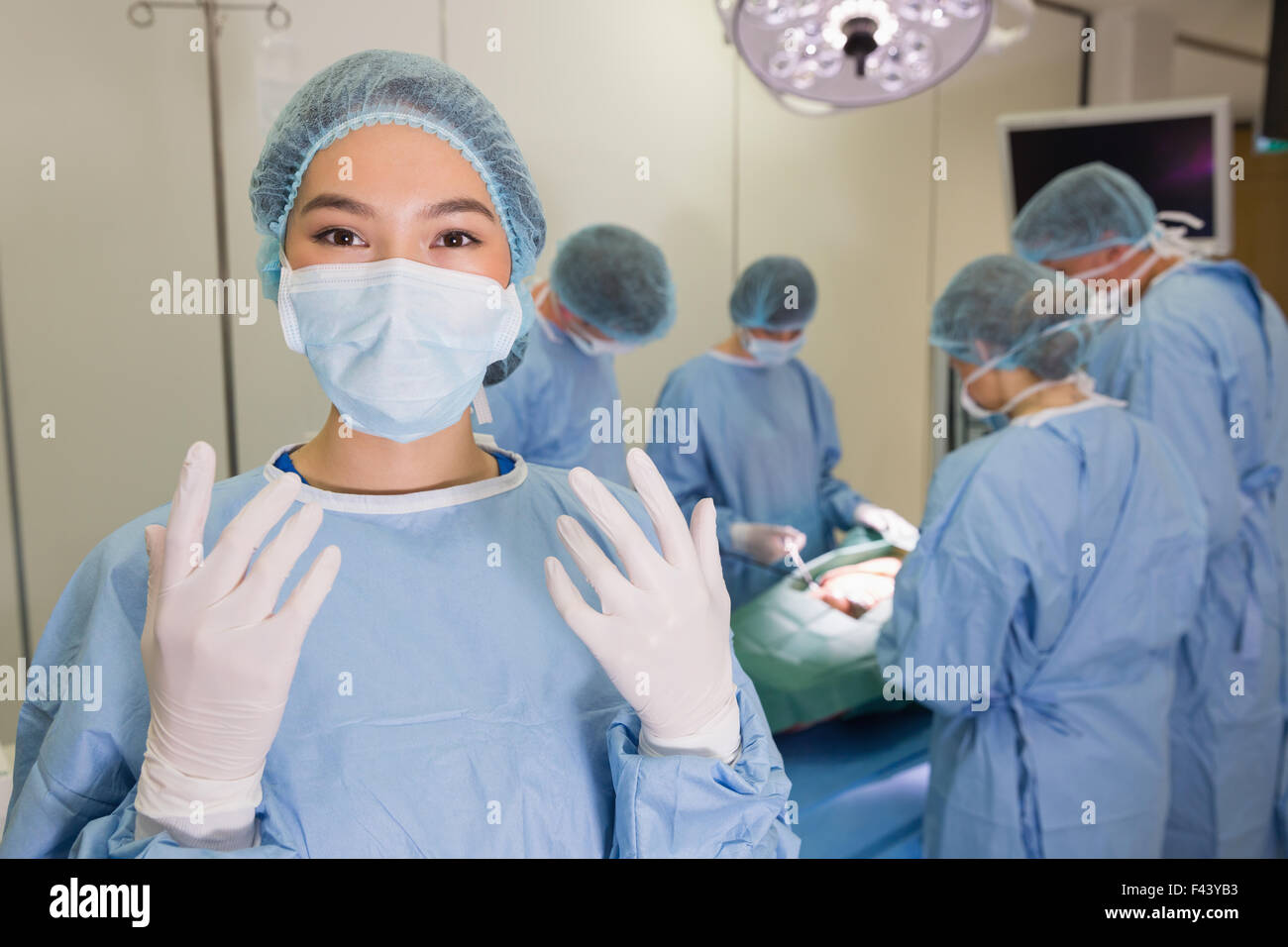 Medical students practicing surgery on model Stock Photo - Alamy