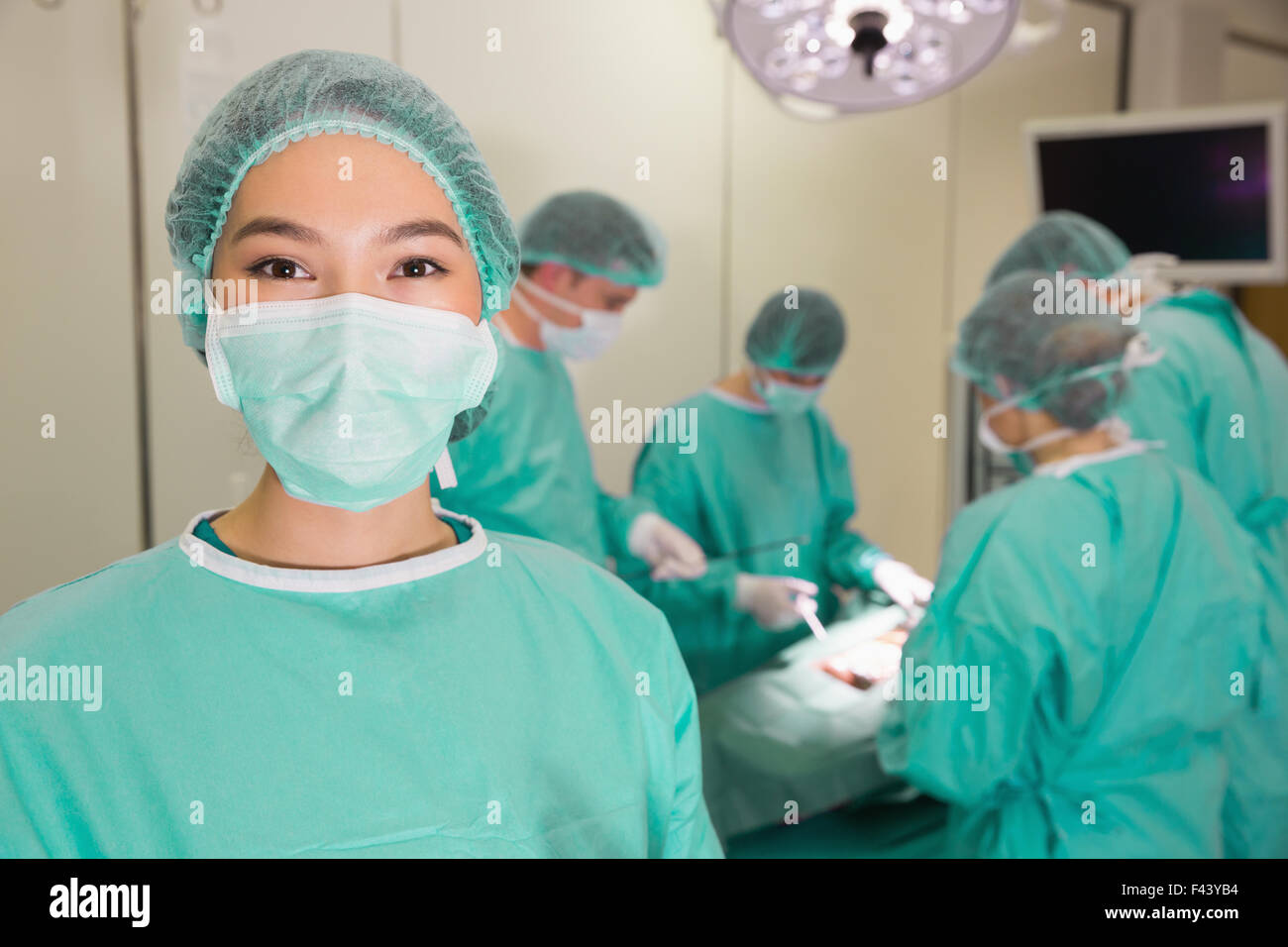 Medical students practicing surgery on model Stock Photo - Alamy
