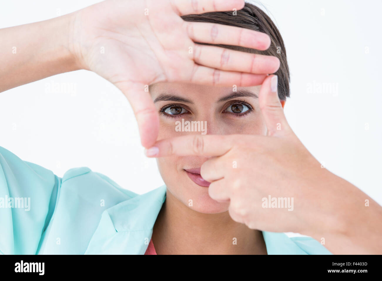 Woman making frame with her hands Stock Photo - Alamy