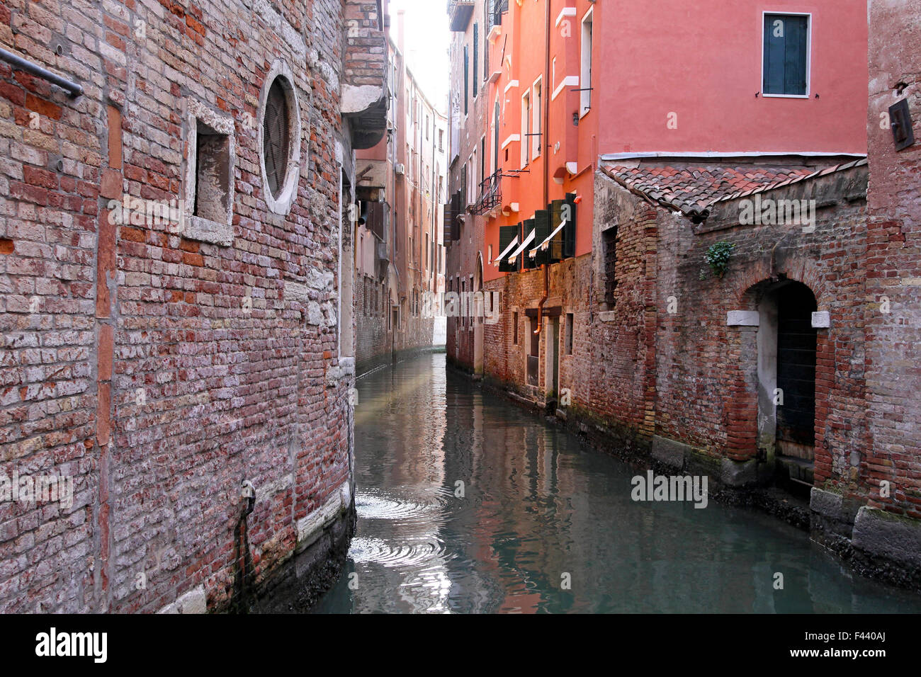 Venetian narrow canal Stock Photo - Alamy