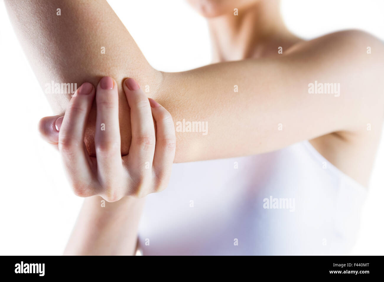 Fit woman with elbow injury Stock Photo - Alamy