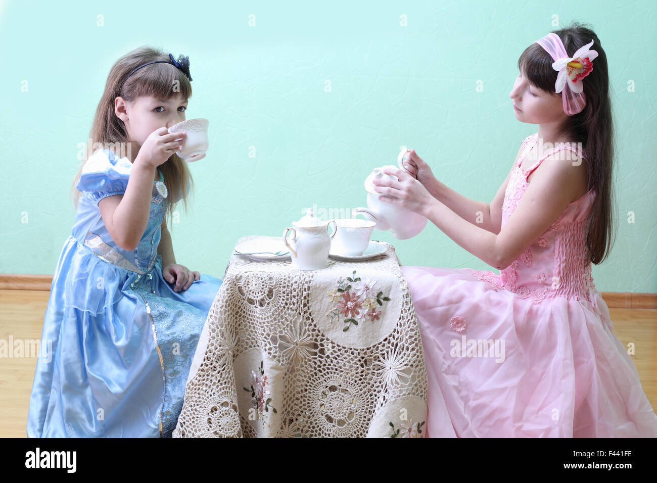 Child tea party teddy hi-res stock photography and images - Alamy
