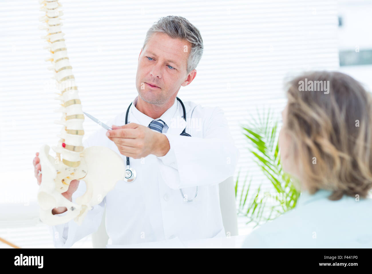 Female doctor showing model hi-res stock photography and images - Alamy