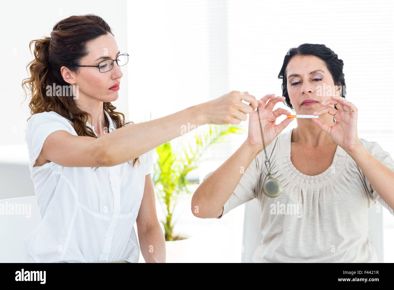 Hypnotize woman hi-res stock photography and images - Alamy