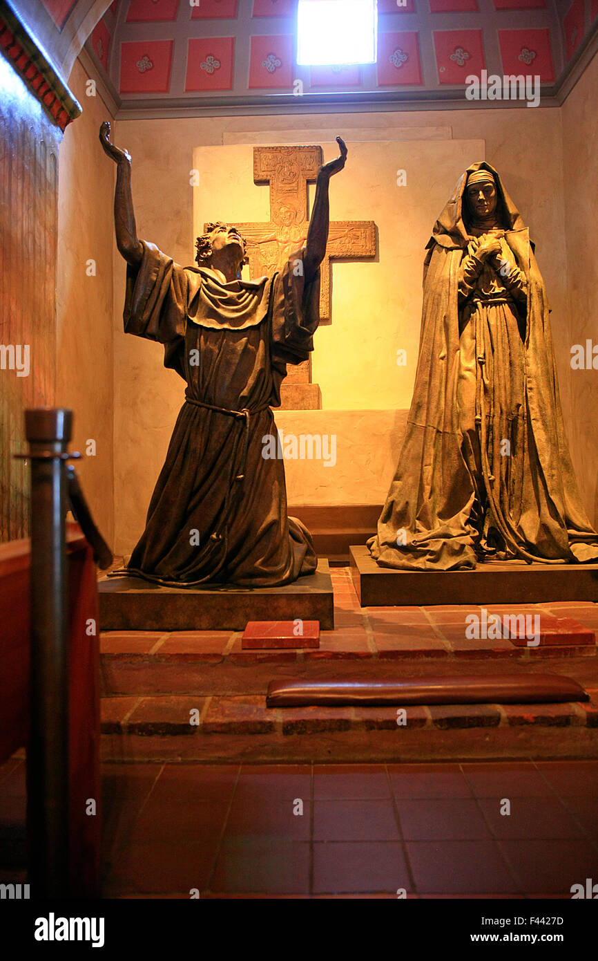 Religious statues inside the Santa Barbara Mission Chapel in California ...
