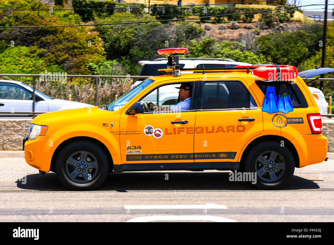 California Lifeguard yellow 4x4 SUV vehicle patrolling the beach area ...