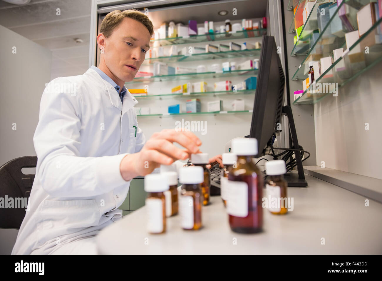 Pharmacist at her desk hi-res stock photography and images - Alamy