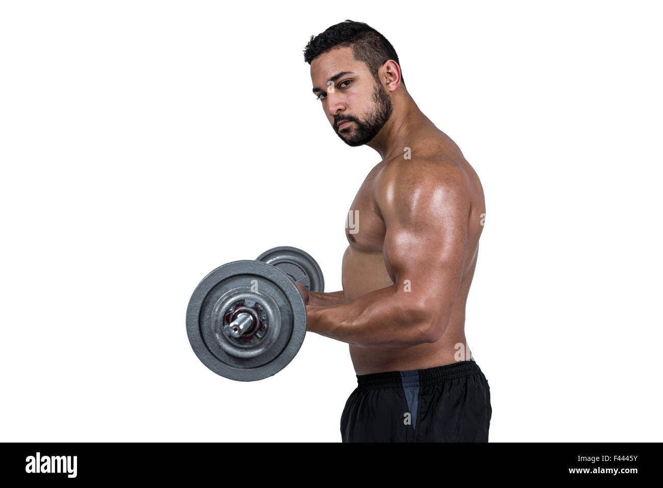 Muscular man lifting heavy barbell Stock Photo - Alamy