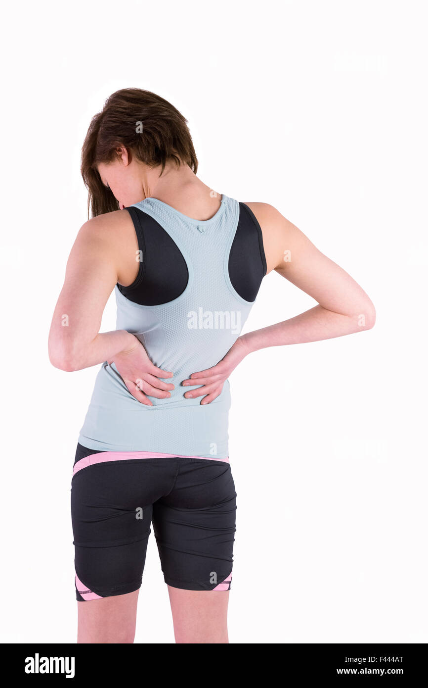 Woman with back injury Stock Photo - Alamy