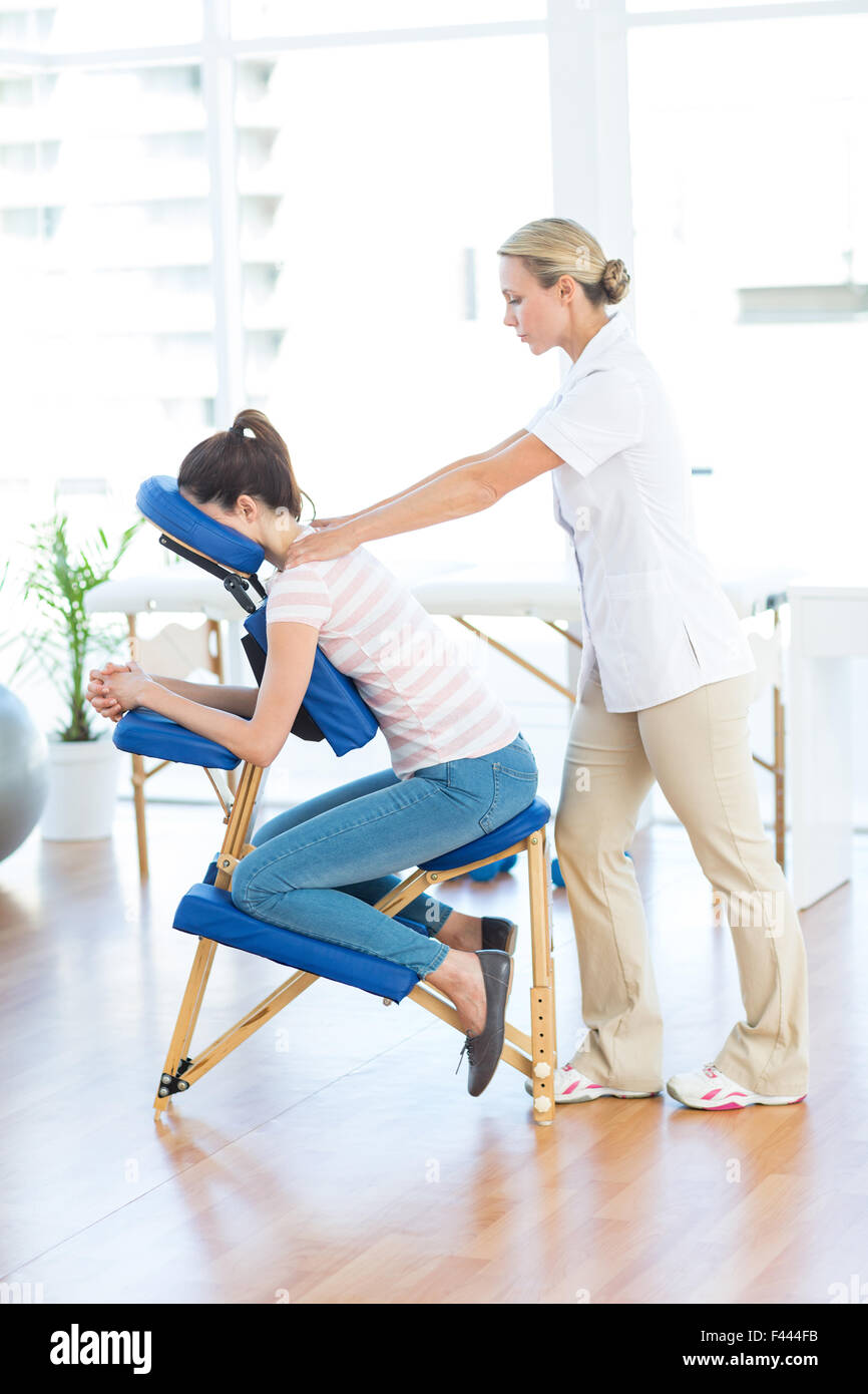 Woman having back massage Stock Photo - Alamy