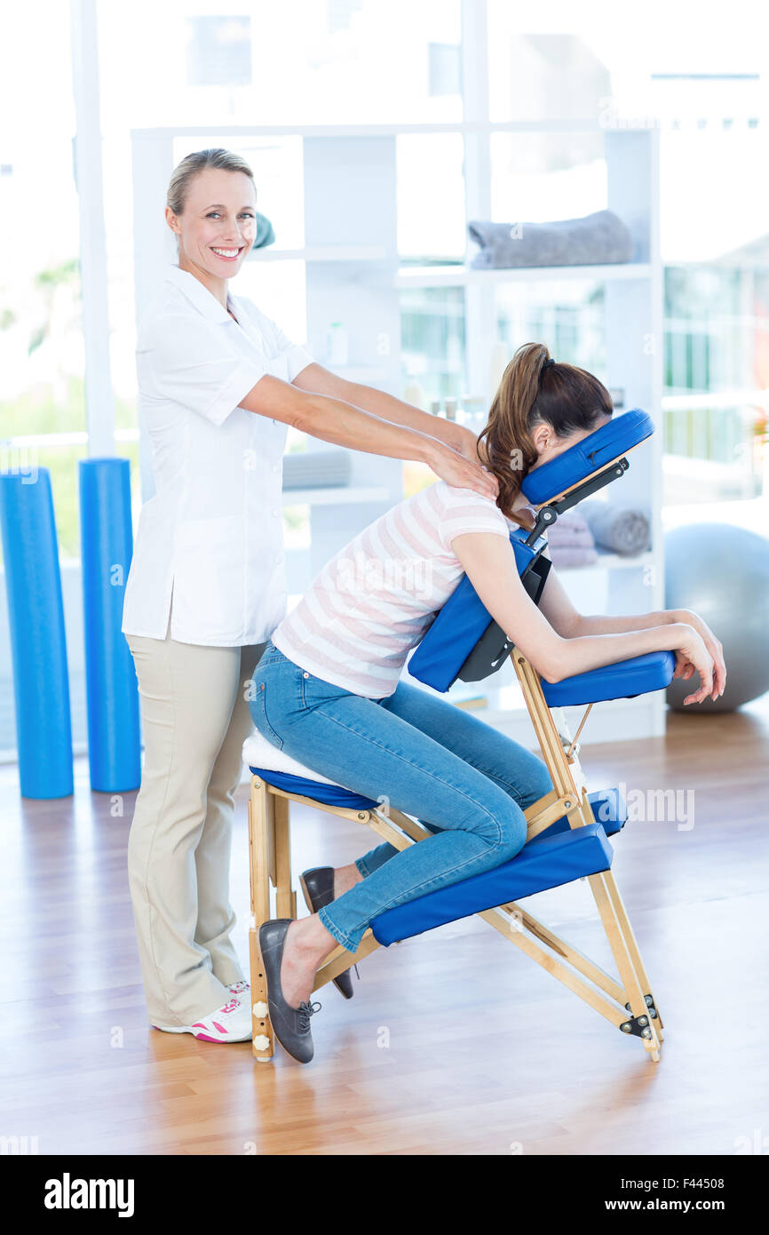 Woman having back massage Stock Photo - Alamy