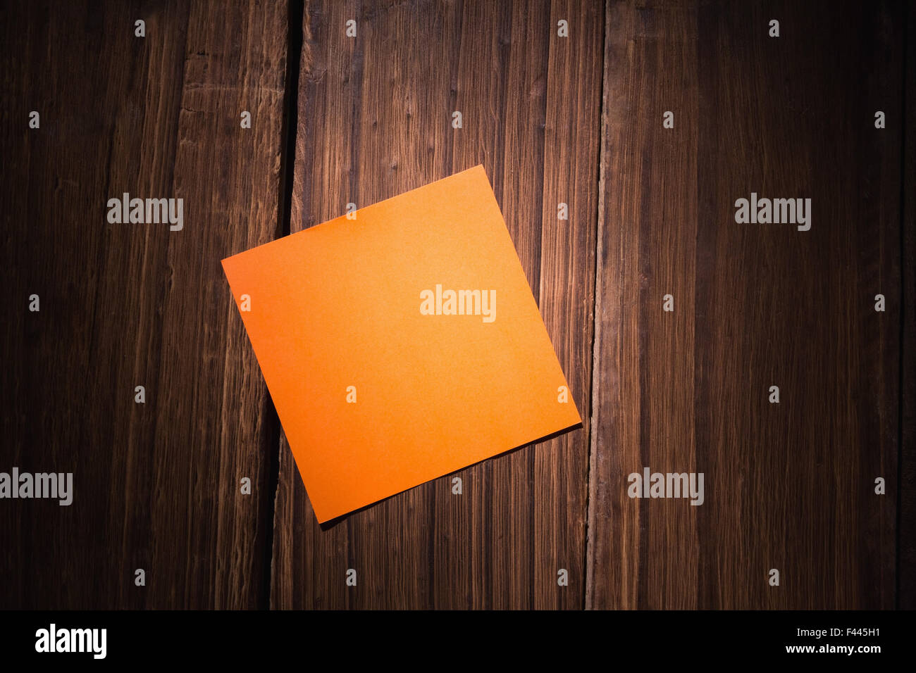 Orange post it Stock Photo - Alamy