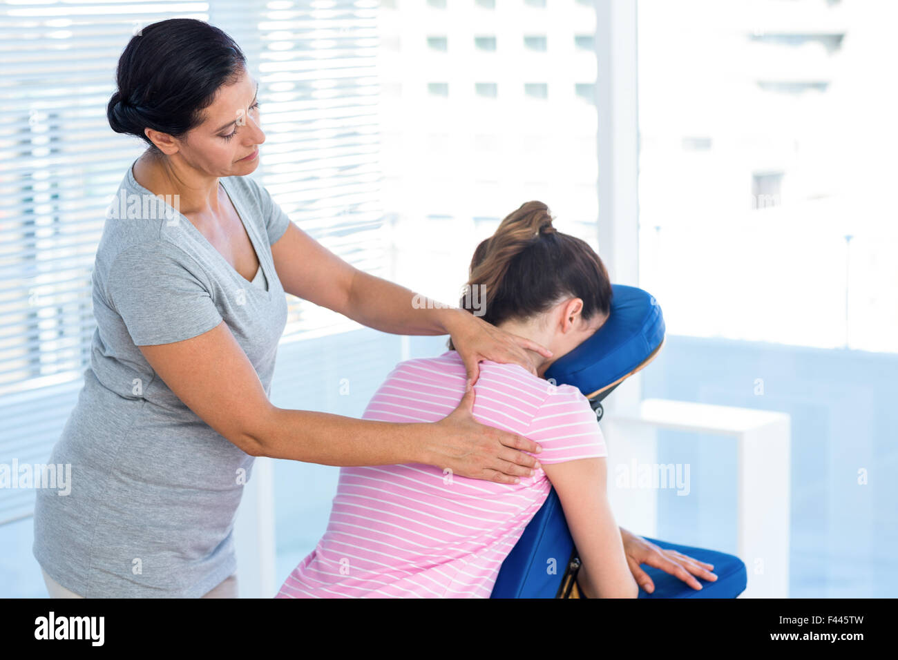 Shoulder blade massage hi-res stock photography and images - Alamy