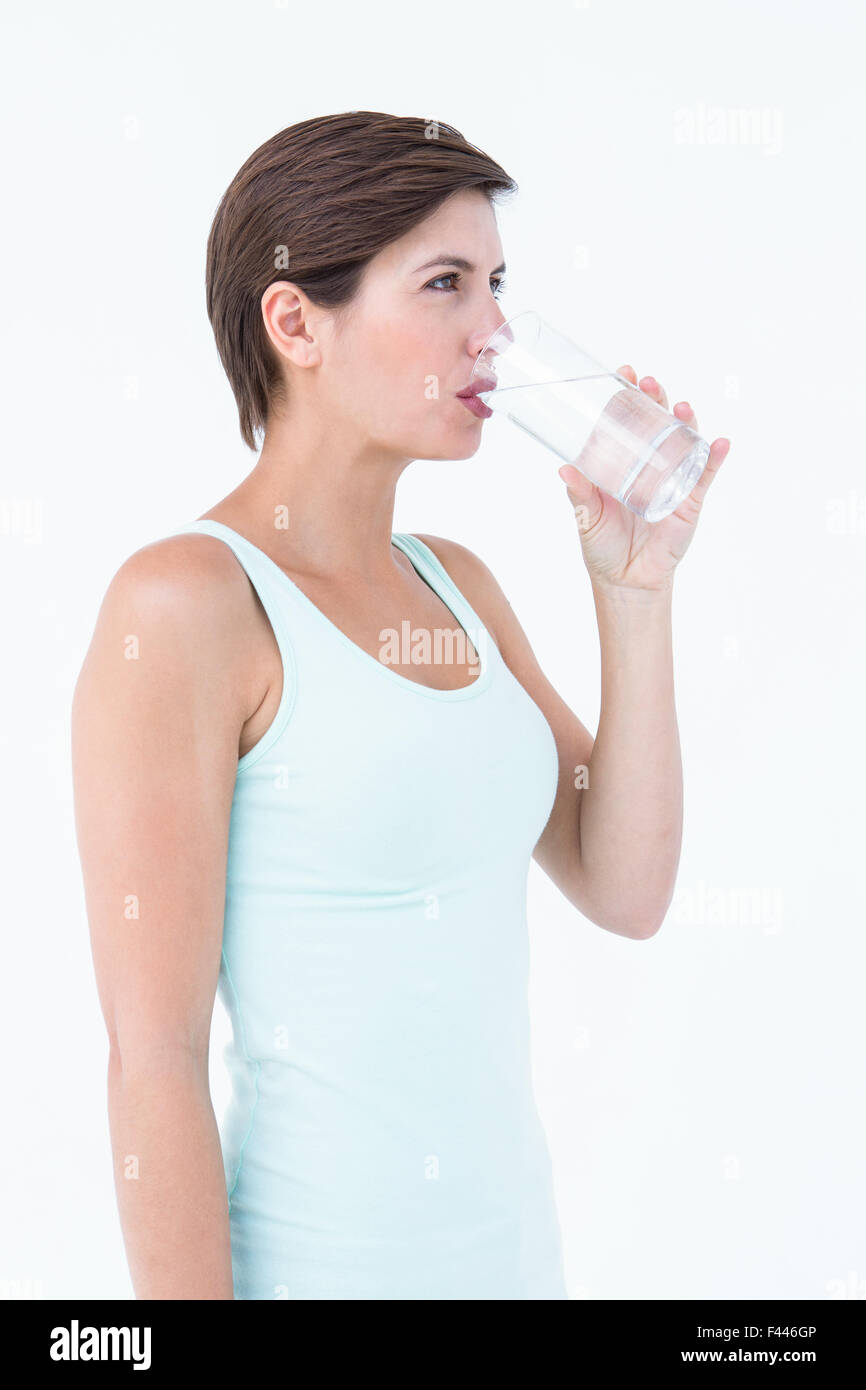 Woman drinking glass of water Stock Photo - Alamy