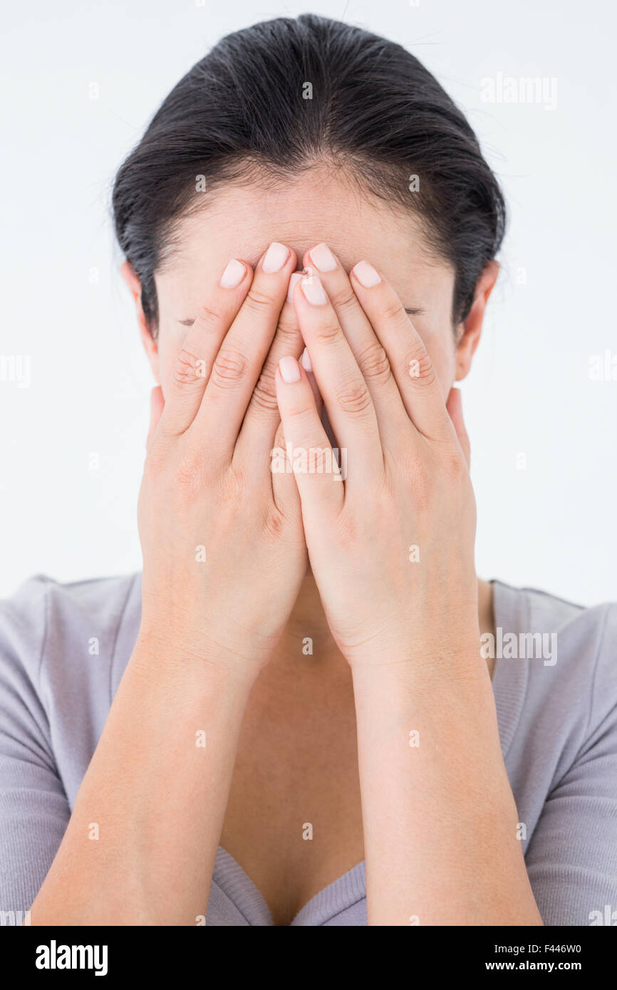 Woman hiding face sad hi-res stock photography and images - Alamy