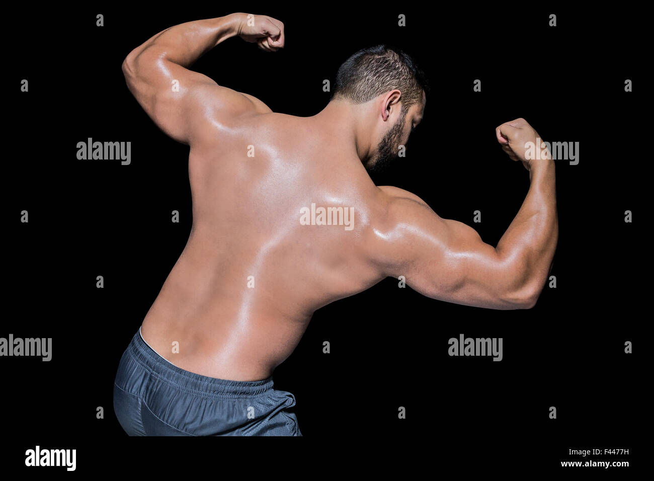 Bodybuilder man flexing his muscles Stock Photo - Alamy