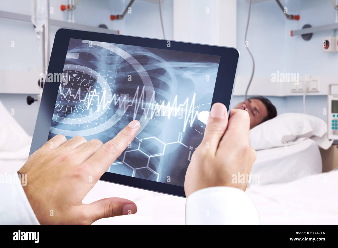 Composite image of man using tablet pc Stock Photo - Alamy