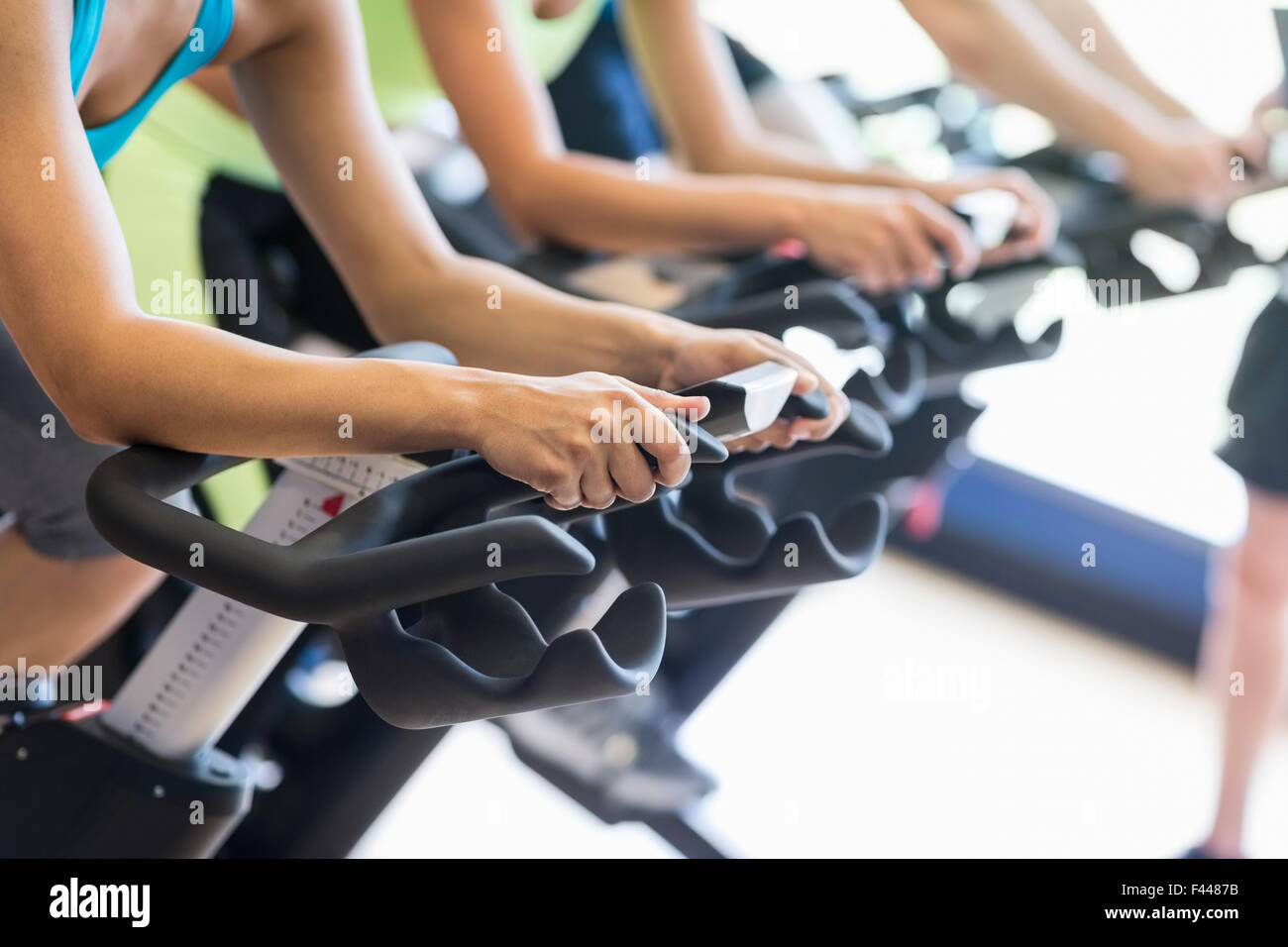 Fit people in a spin class Stock Photo - Alamy