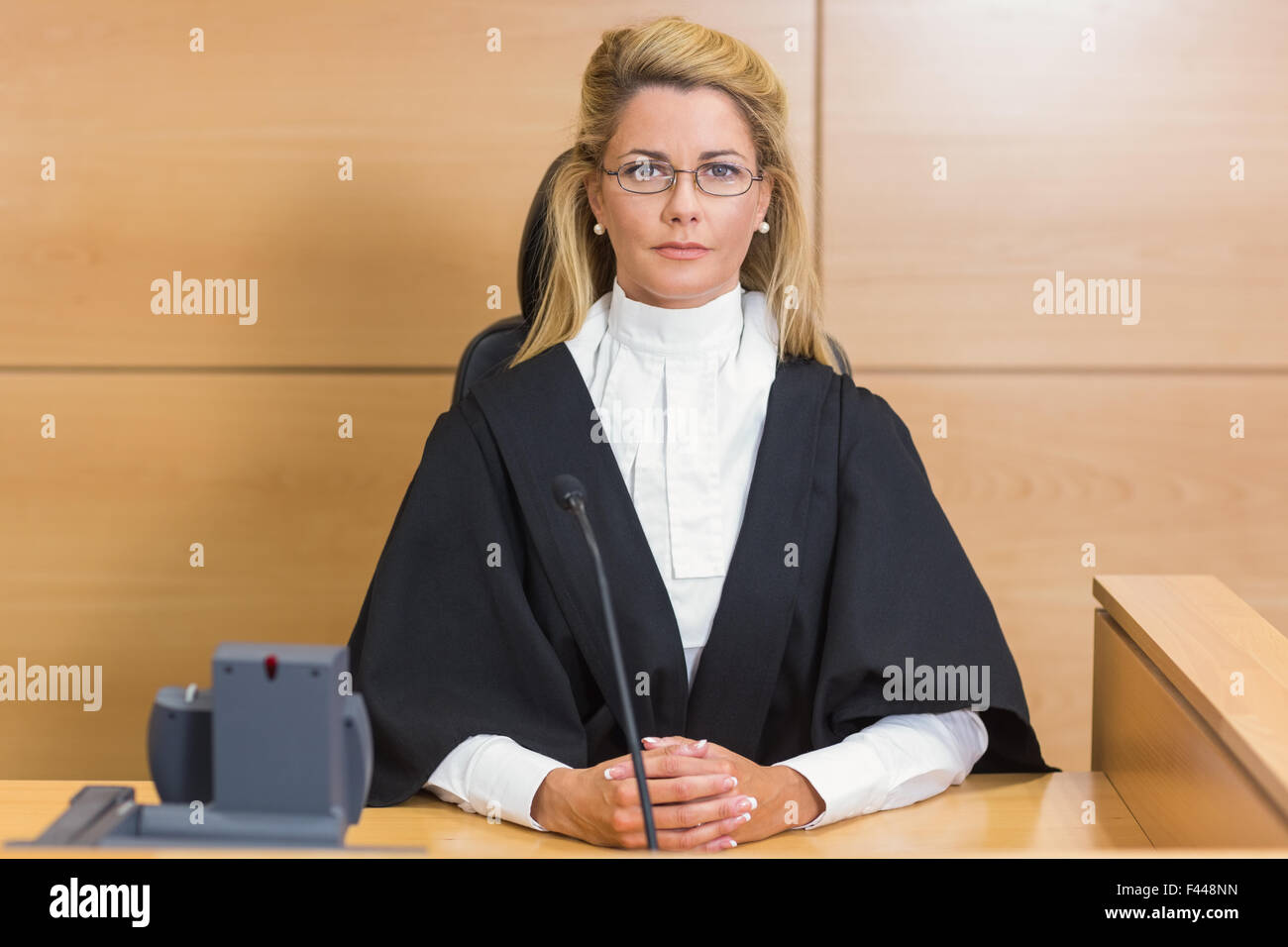 Stern judge looking at camera Stock Photo - Alamy