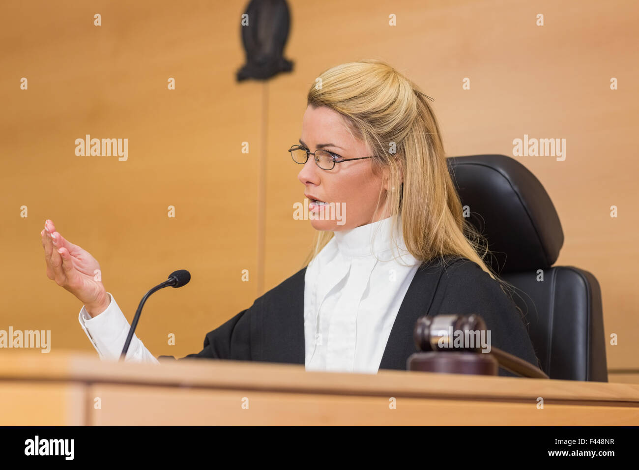 Stern judge speaking to the court Stock Photo - Alamy