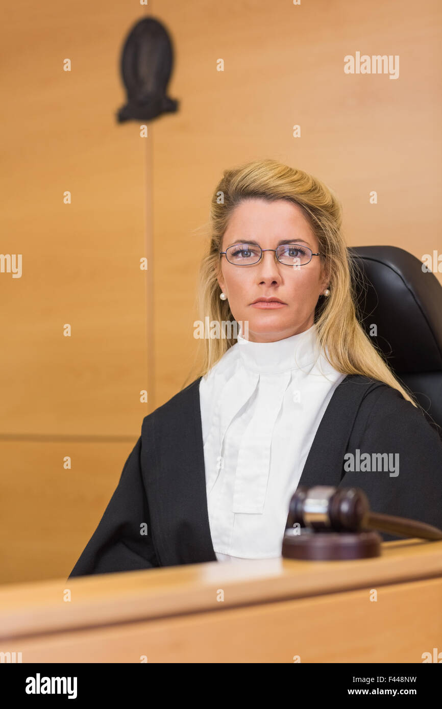 Stern judge looking at camera Stock Photo - Alamy