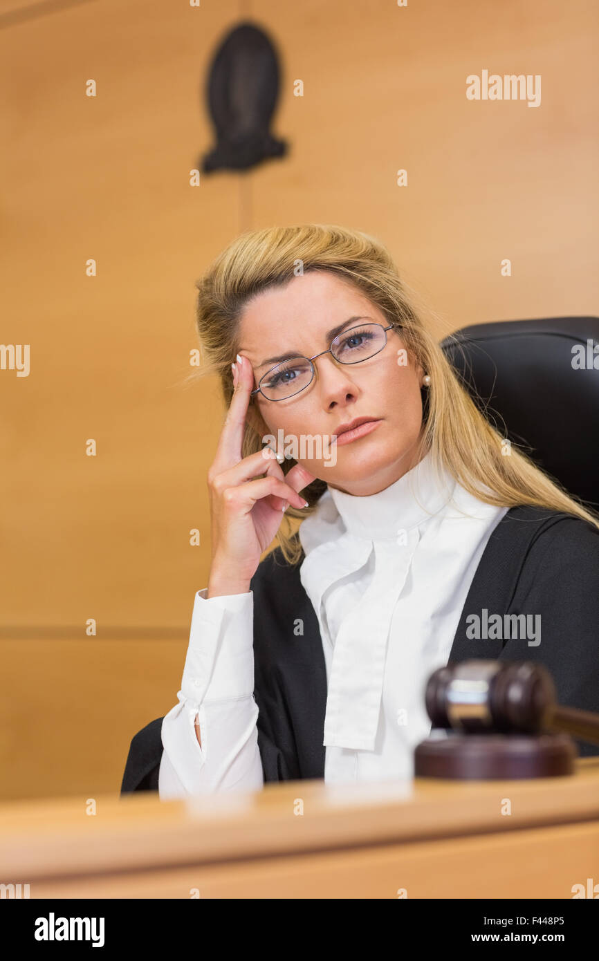 Stern judge looking at camera Stock Photo - Alamy