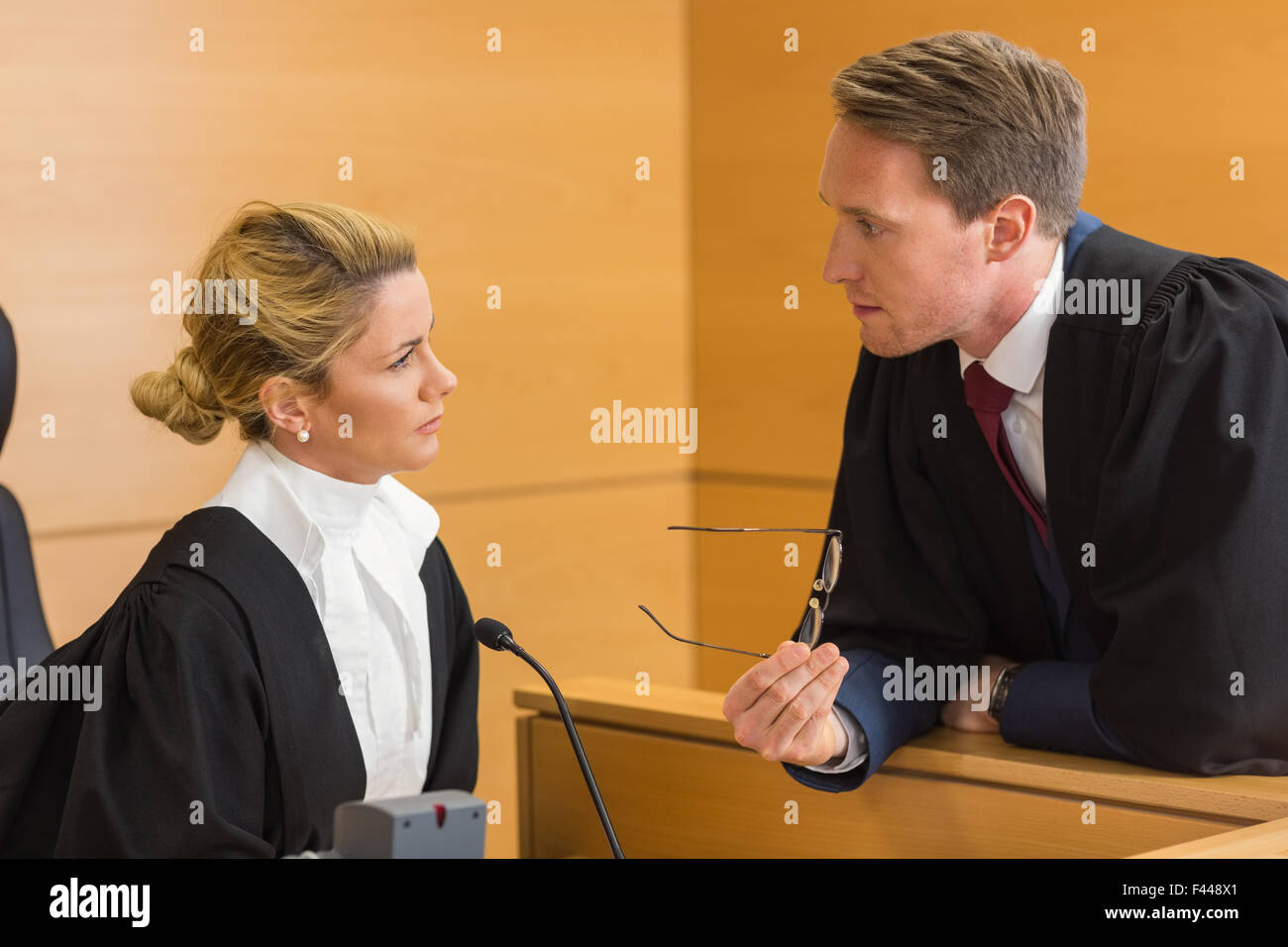 Lawyer speaking with the judge Stock Photo - Alamy
