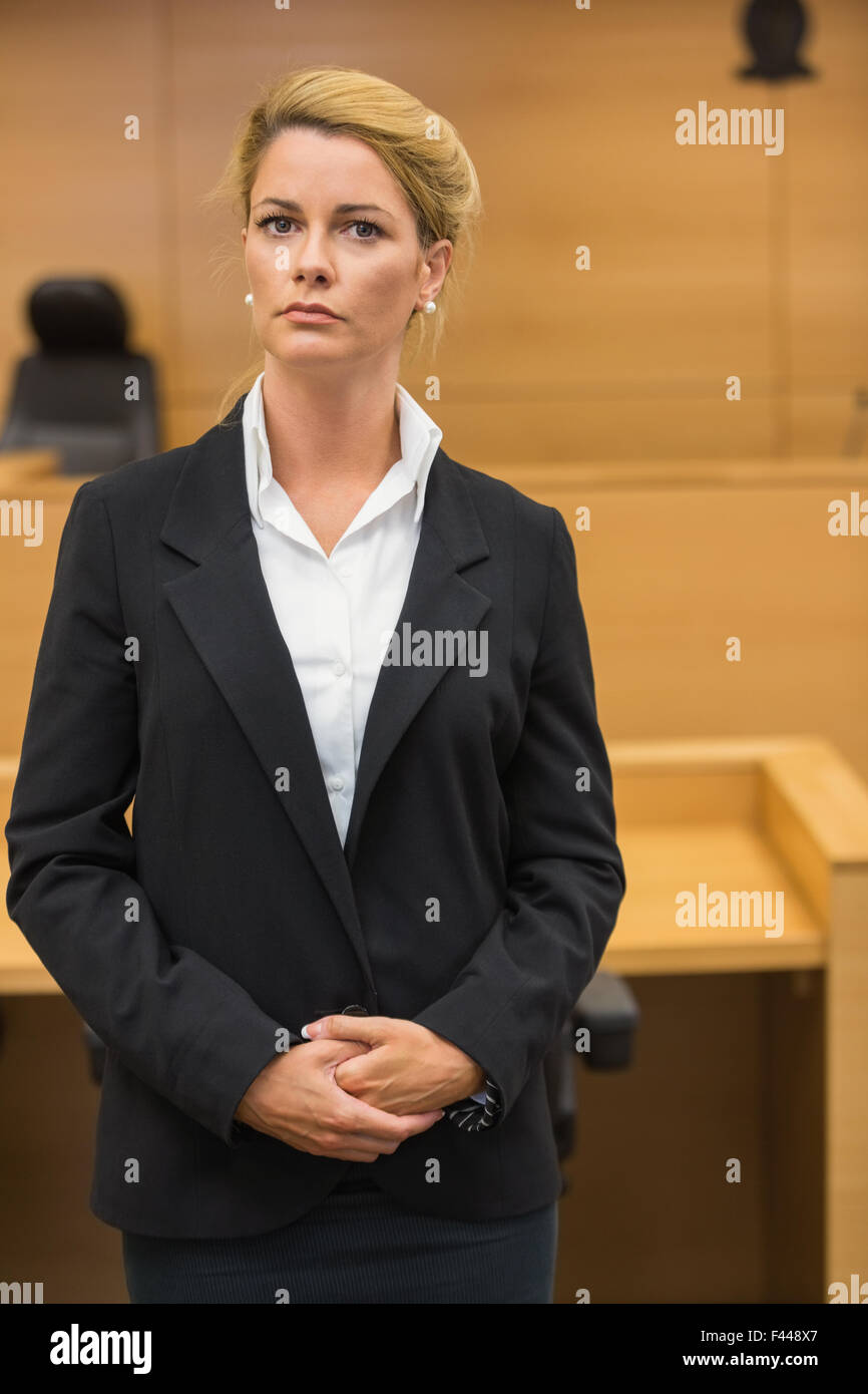 Serious lawyer looking at camera Stock Photo - Alamy