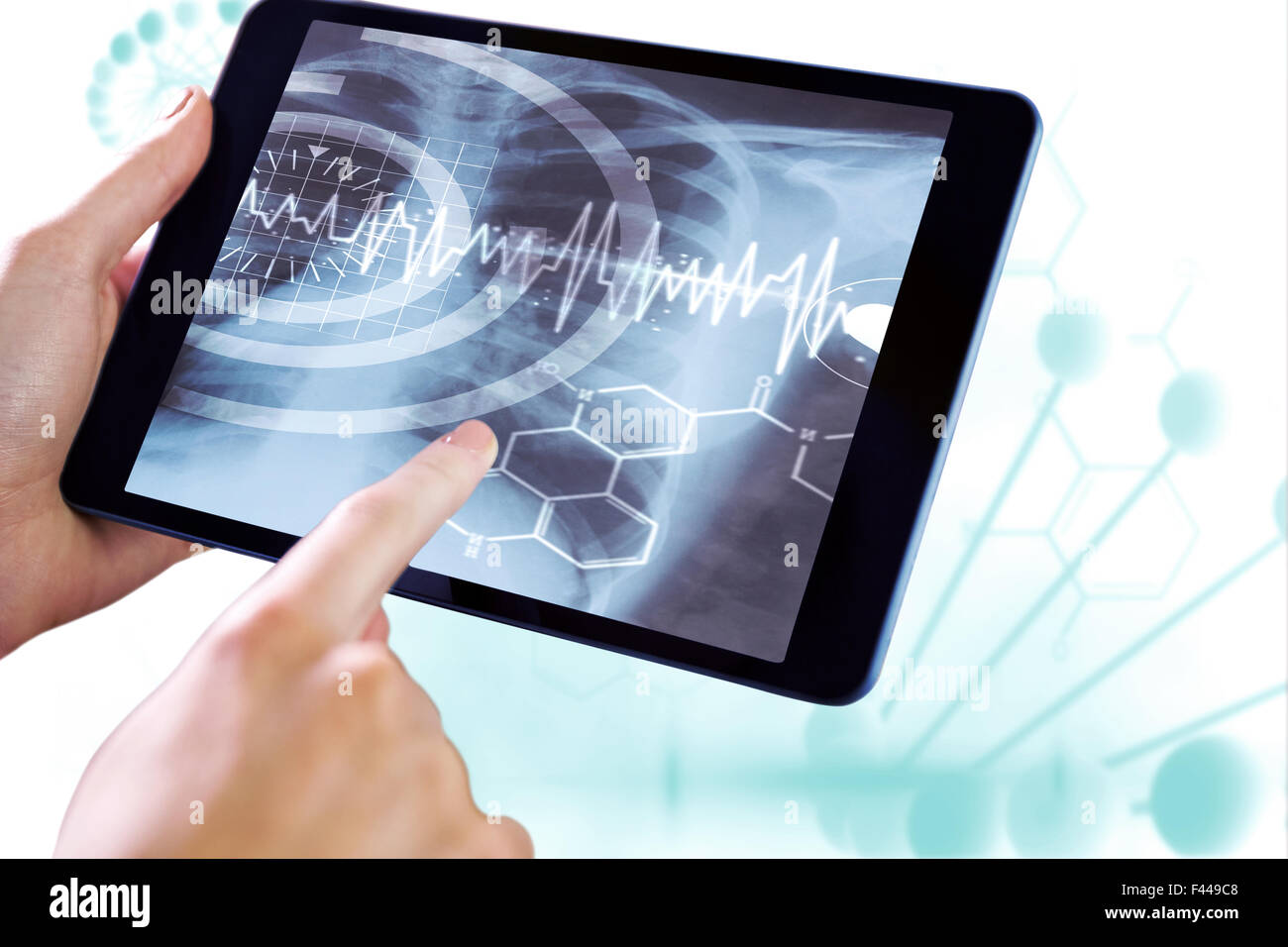 Composite image of man using tablet pc Stock Photo - Alamy