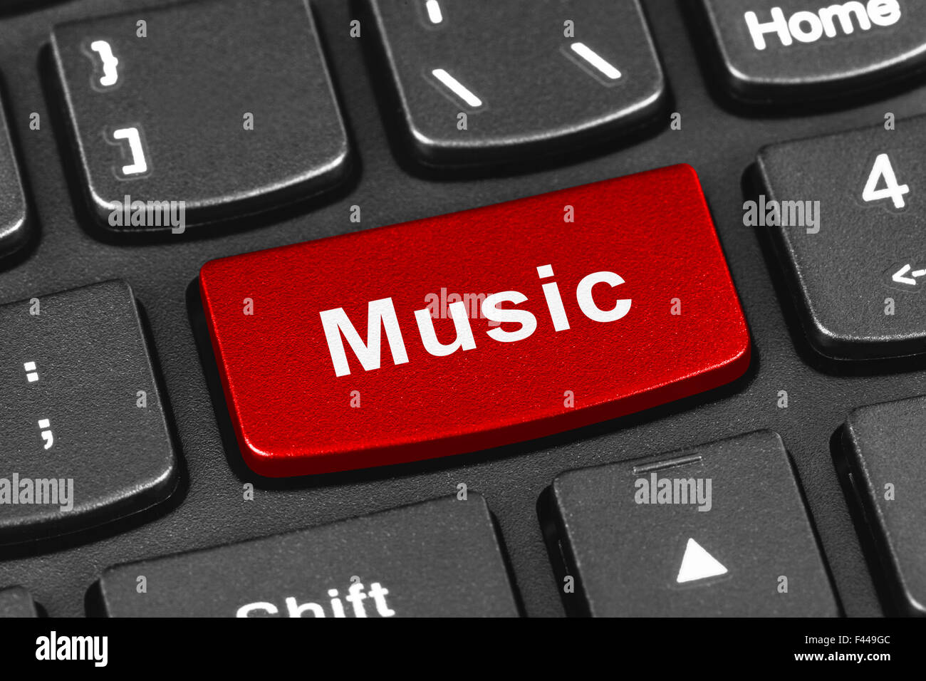 Computer notebook keyboard with Music key Stock Photo - Alamy