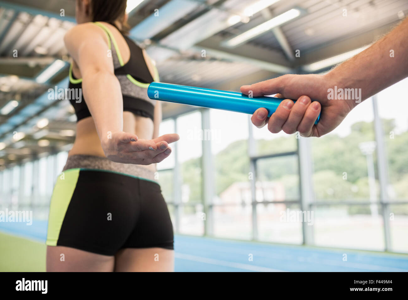 Man holding baton hi-res stock photography and images - Alamy